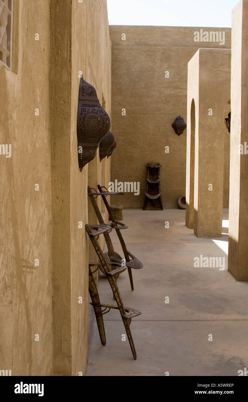 Steps leaning outside hotel room in shaded walkway in Dubai desert ...