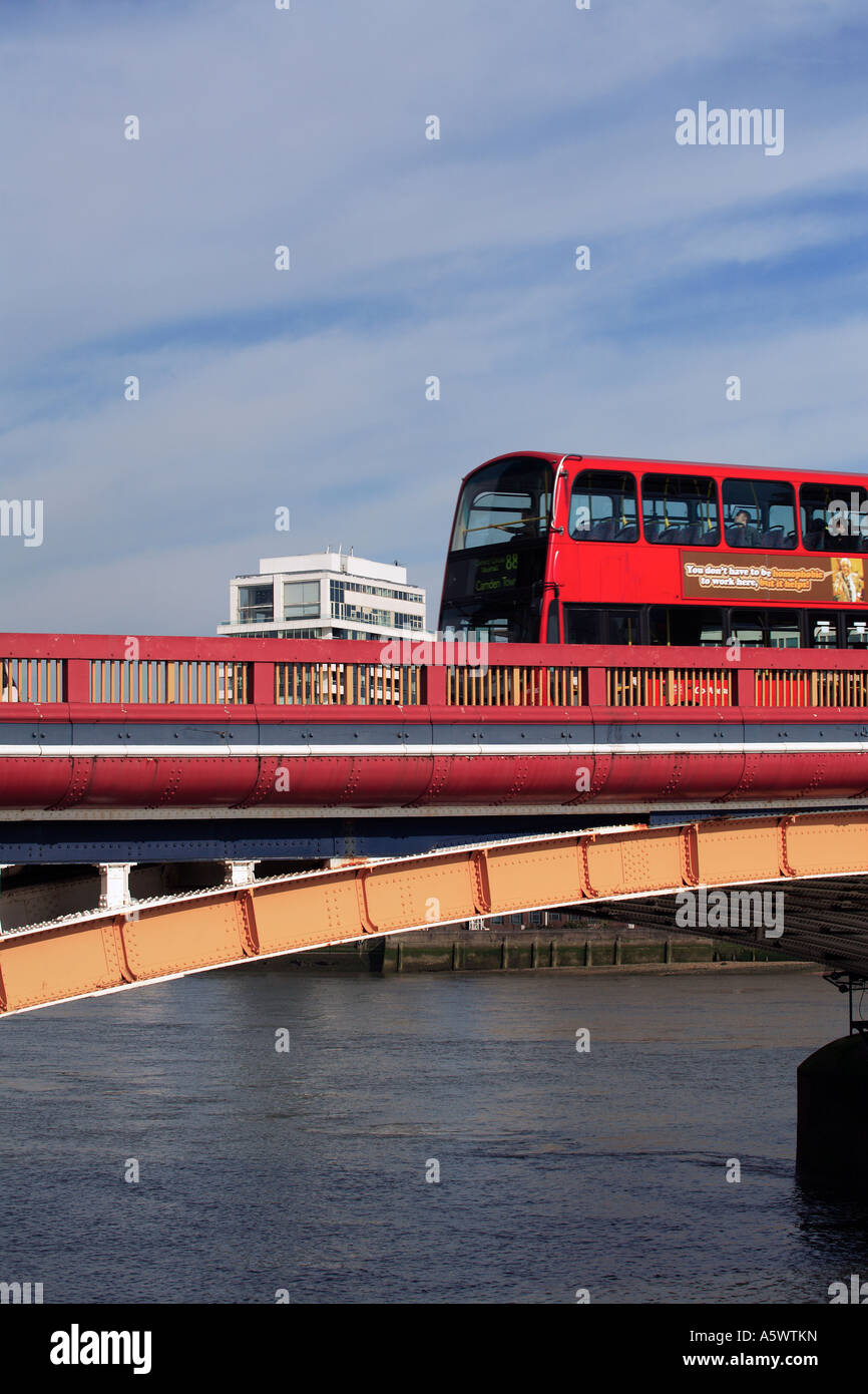 London bus crossing the vauxhall bridge hi-res stock photography and ...