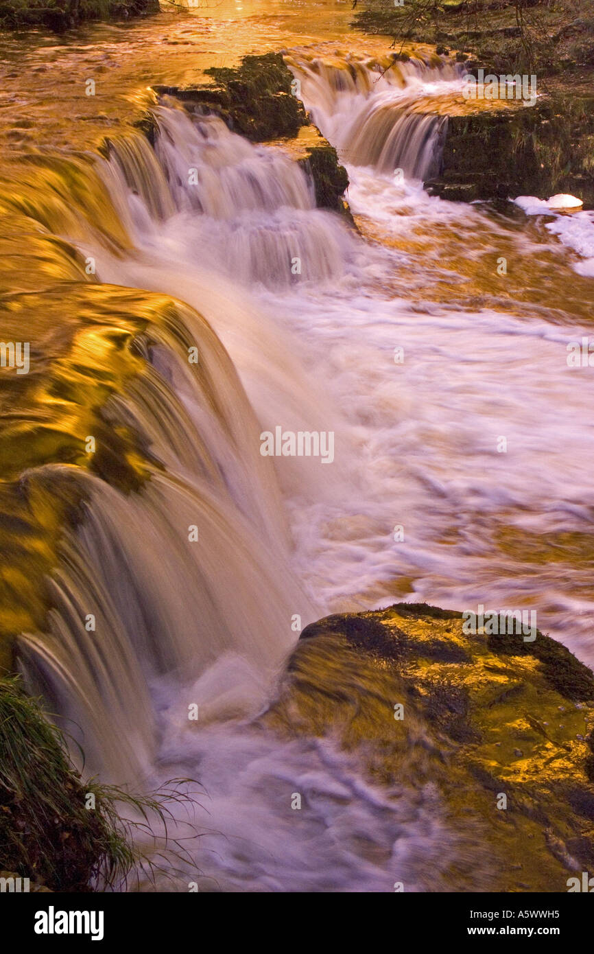 Golden coloured waterfall Stock Photo - Alamy