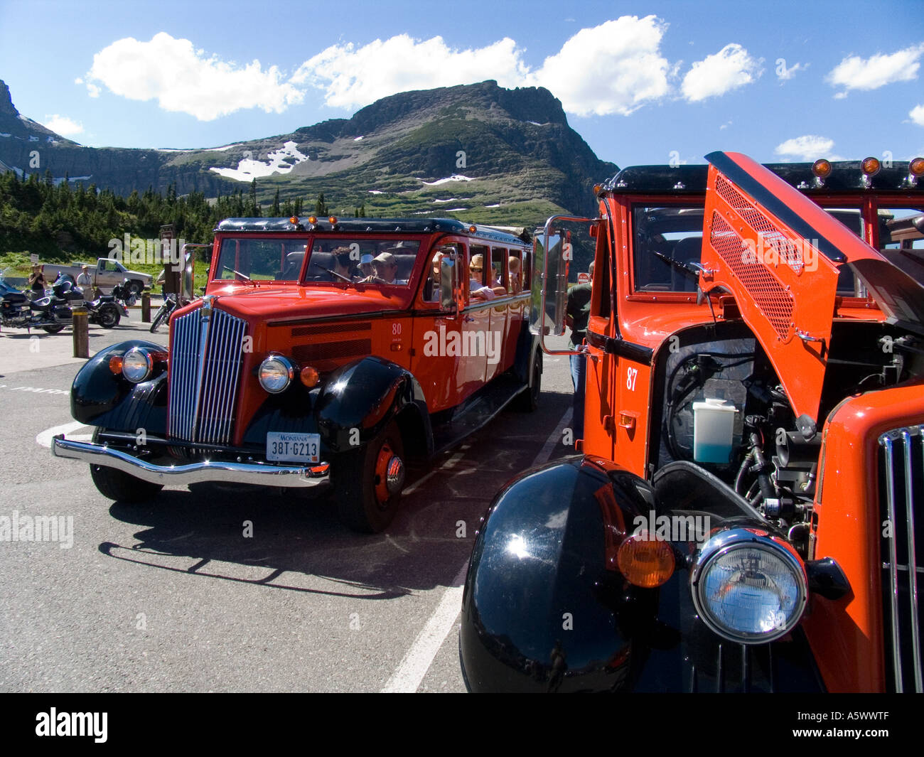 Historic red buses Glacier National Park Montana USA Stock Photo - Alamy