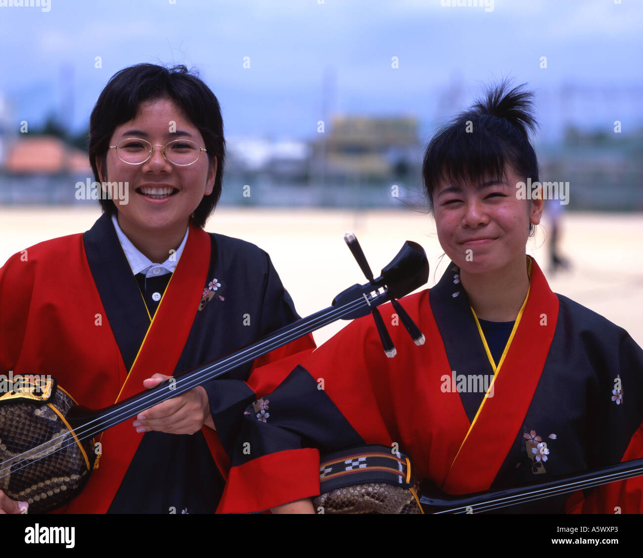 Okinawan girls in kimono with sanshin the traditional three-stringed ...