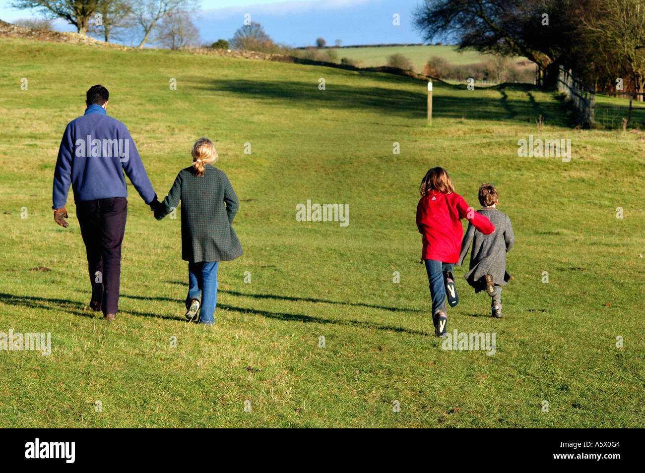 Kids with dad on a walk hi-res stock photography and images - Alamy