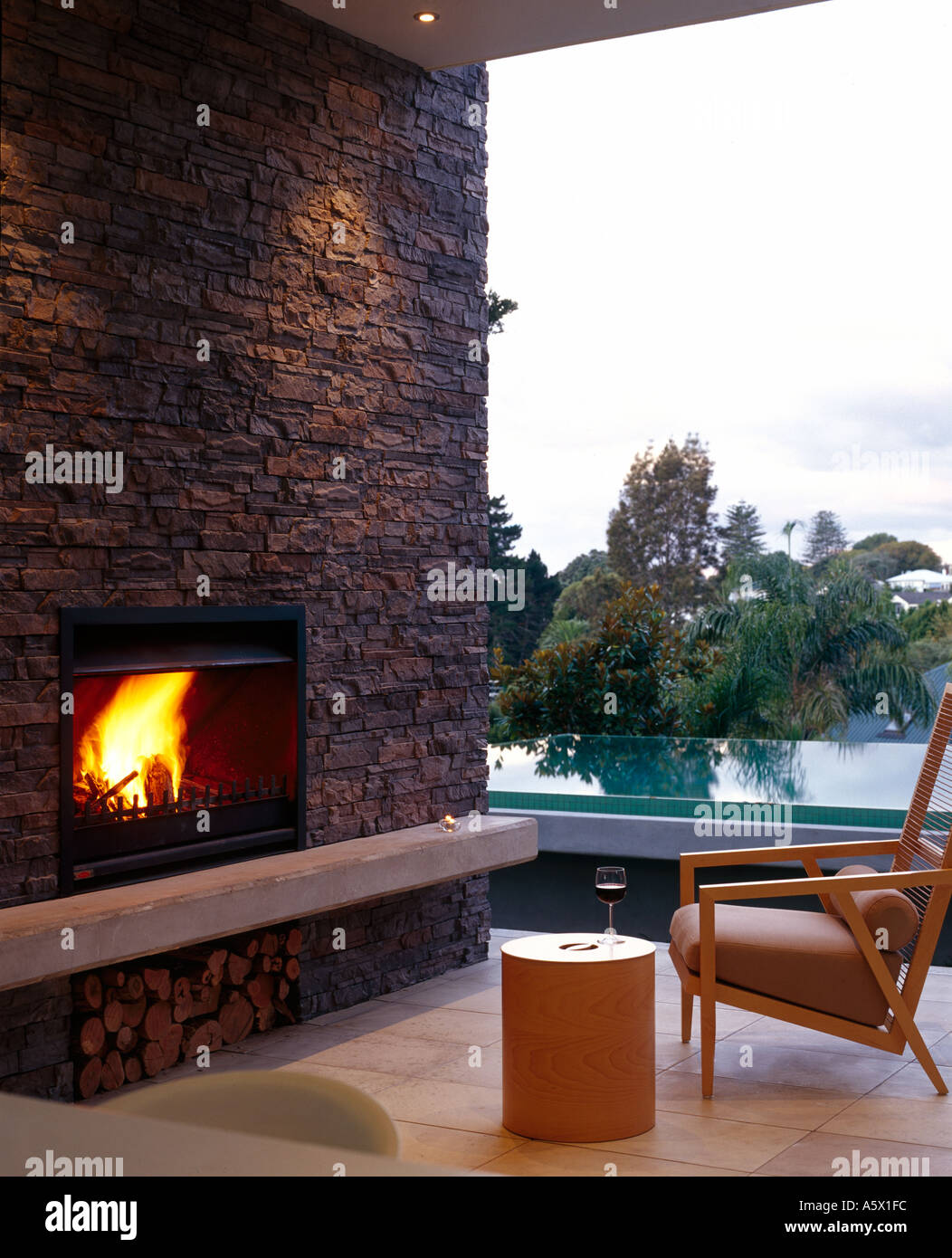 'See Through' Residence, Auckland. Outdoor fire place and swimming pool ...