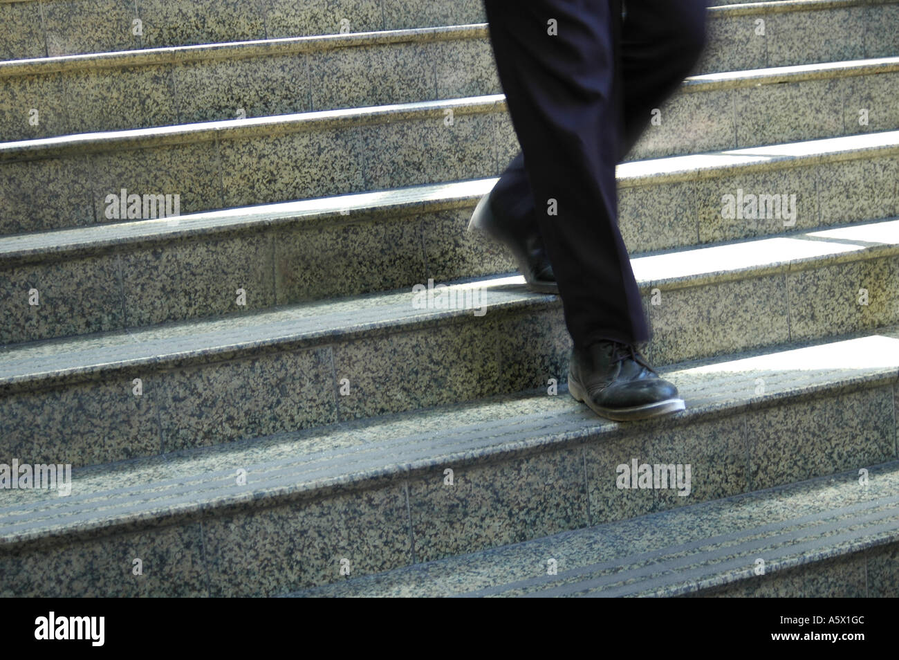 Walking down steps Stock Photo - Alamy