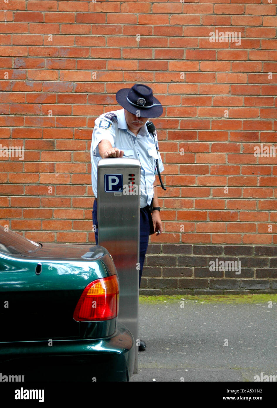 Parking officer attendant hi-res stock photography and images - Alamy