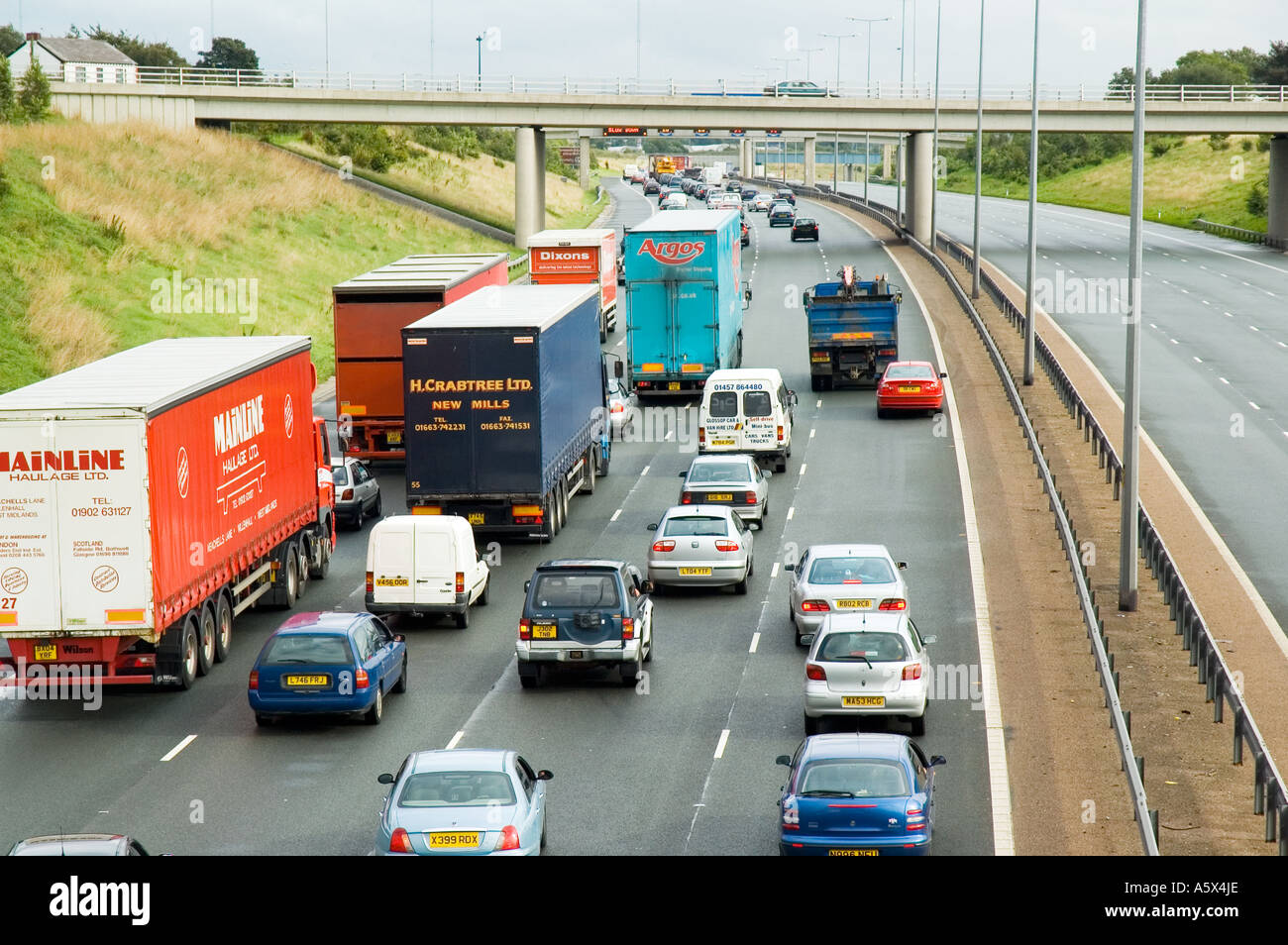 Traffic queue on the M60 motorway near Ashton under Lyne, Greater ...