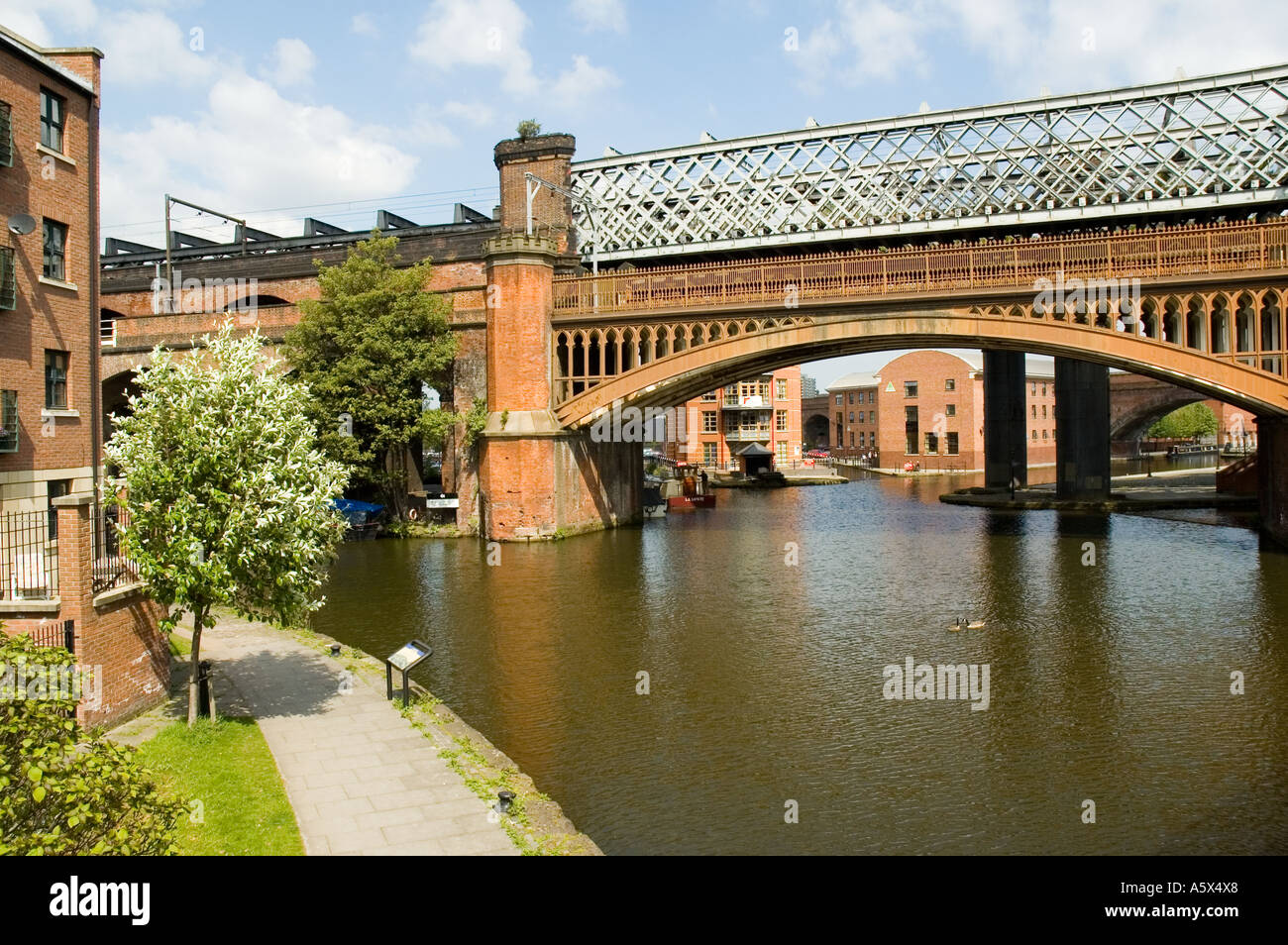 Victorian railway bridge at Castlefield Basin, Manchester, UK Stock ...