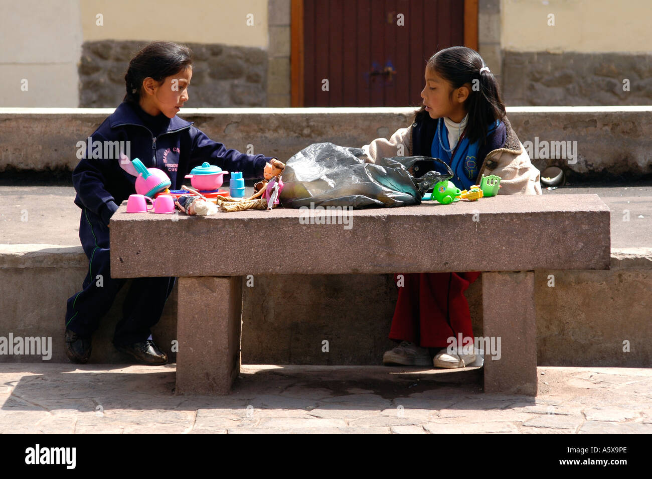 Girls playing with kitchen toys hi-res stock photography and images - Alamy