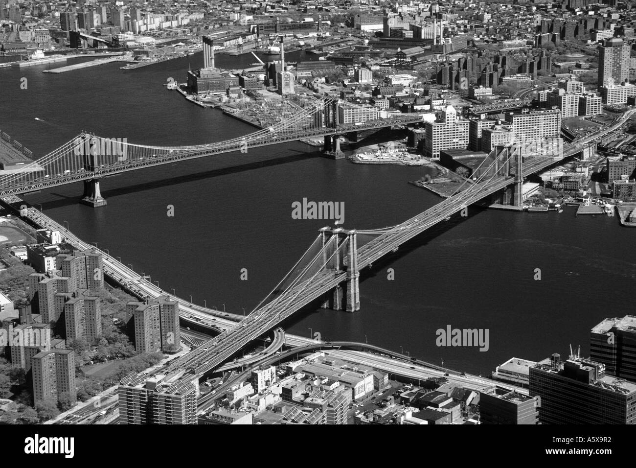 New York's East River with the Manhattan Bridge and Brooklyn Bridge ...