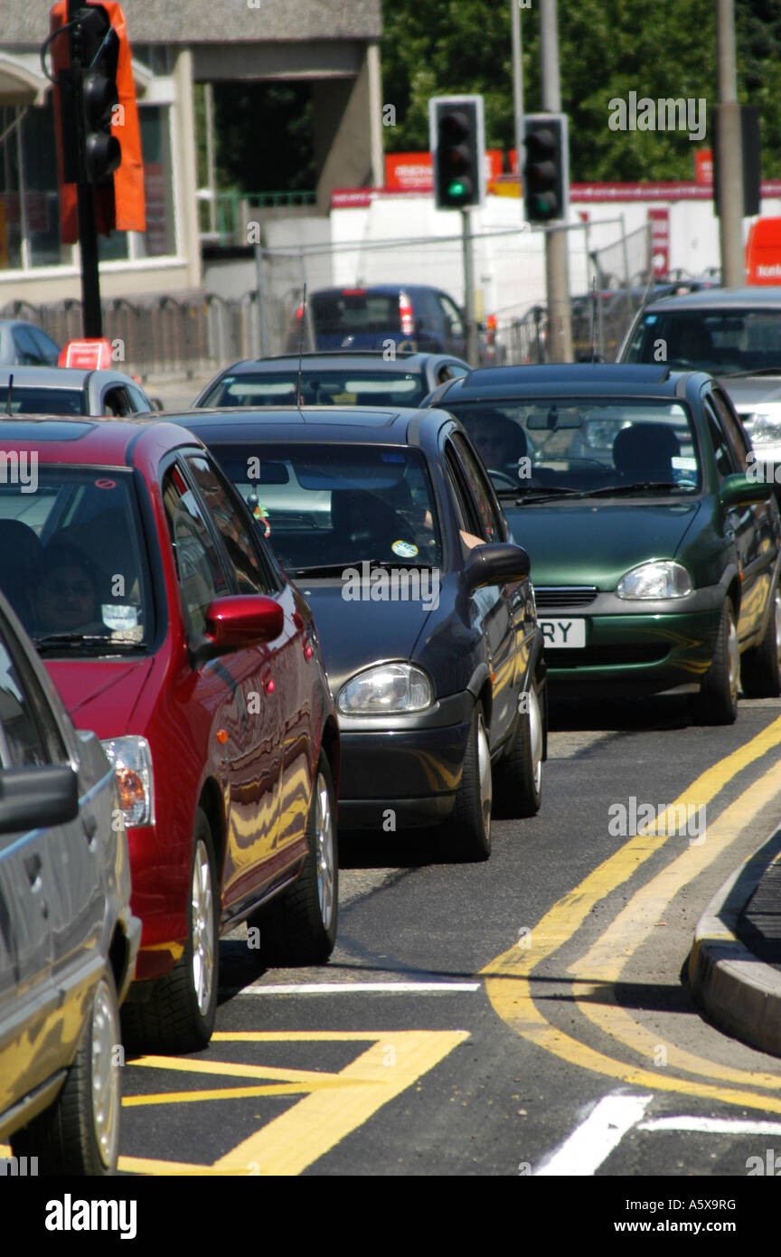 Cars queuing in a city centre in the uk Stock Photo - Alamy
