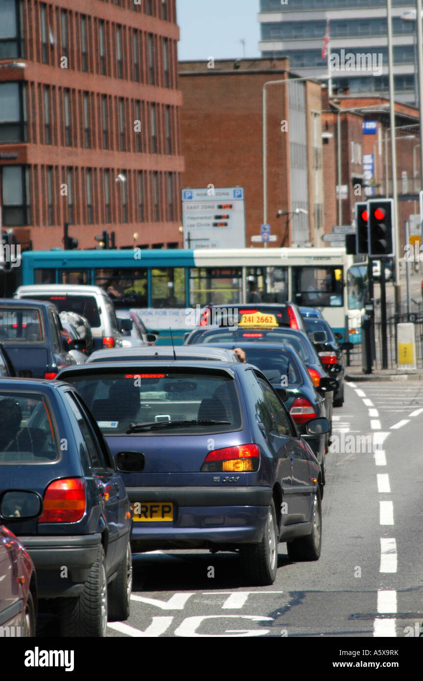 Cars queuing in a city centre in the uk Stock Photo - Alamy