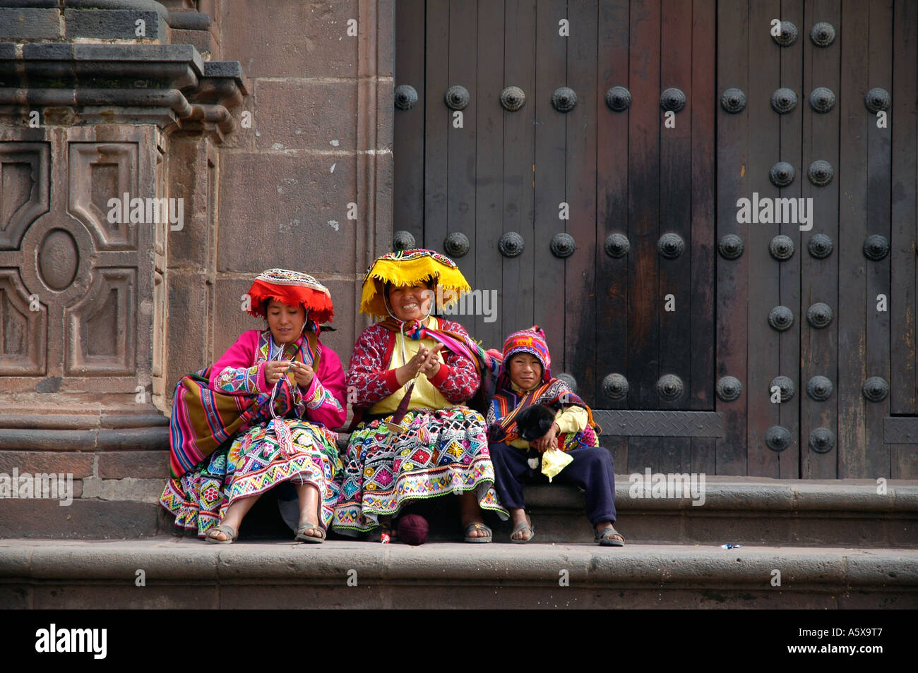Indigenous Quechua people in front of Santo Domingo Church, a.k.a ...