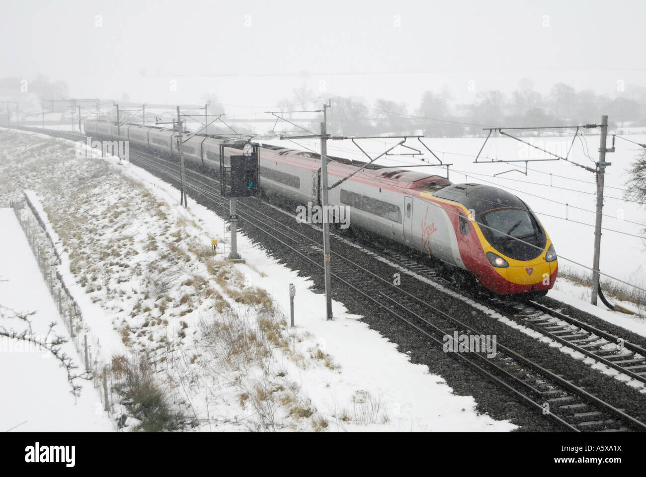 Virgin Trains Pendolino Class 390 train on the West Coast Main Line ...