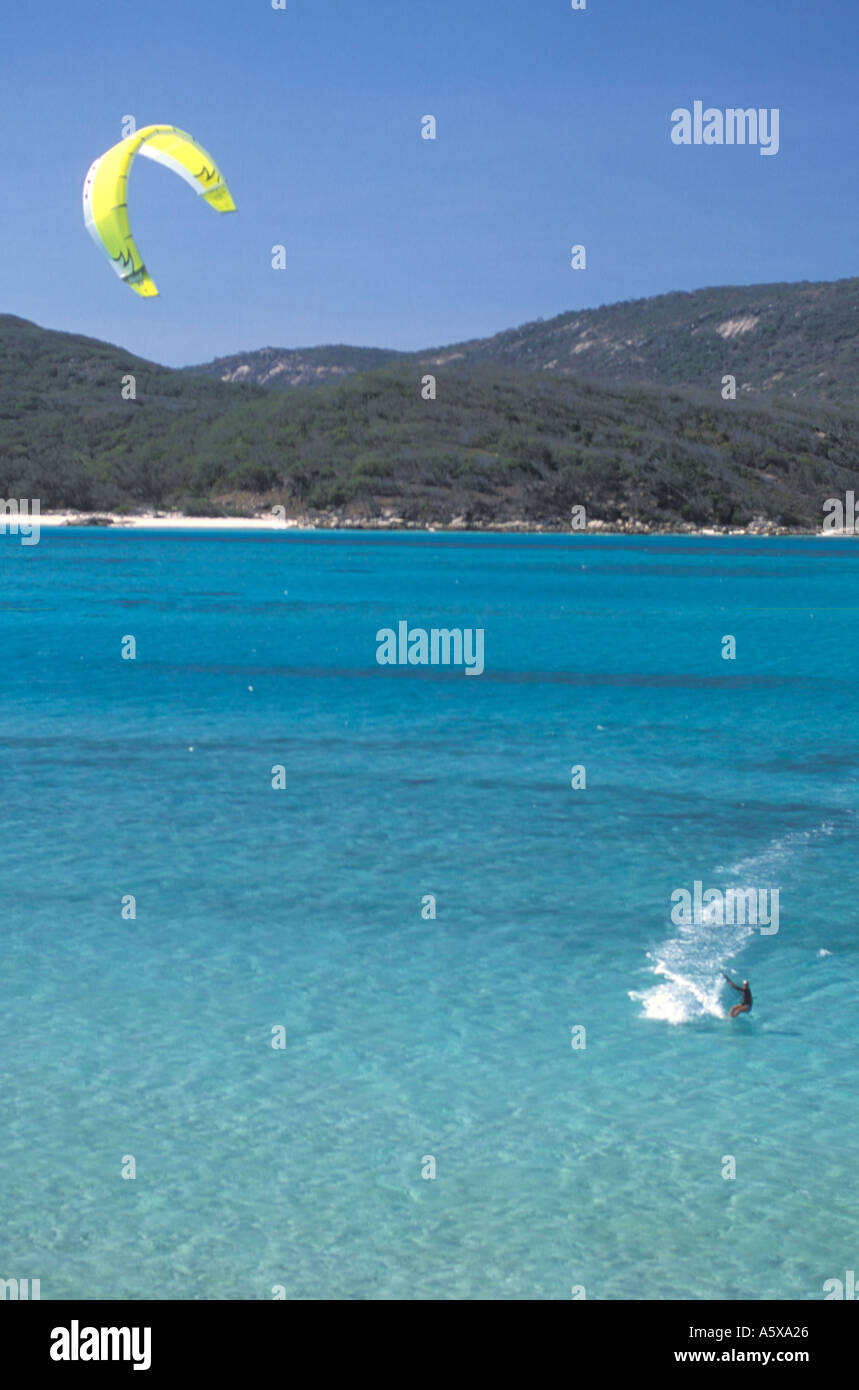Woman kitesurfing in lagoon, Lizard Island, Great Barrier Reef ...