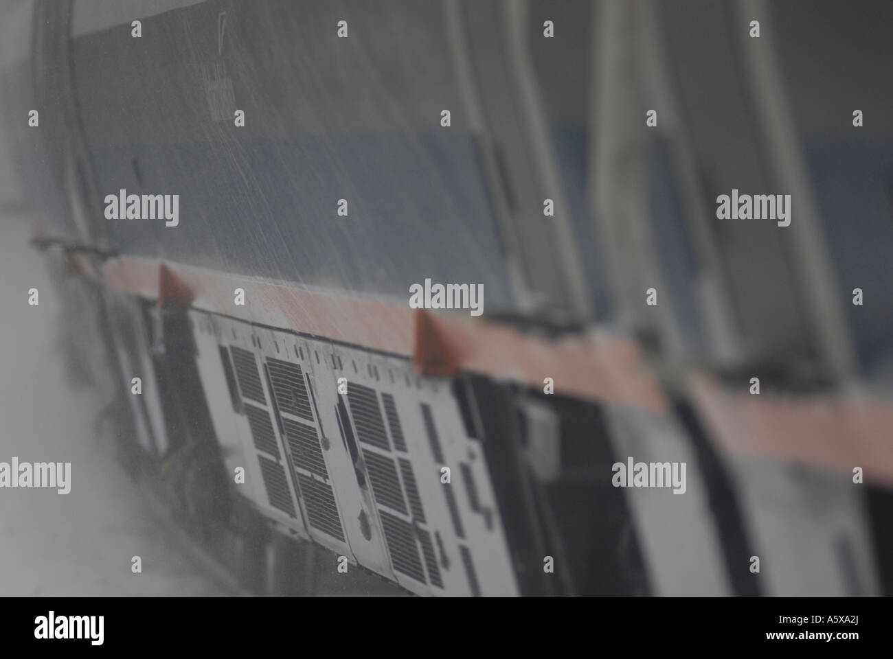 Midland Main Line Meridian train blowing snow off the tracks on a cold ...