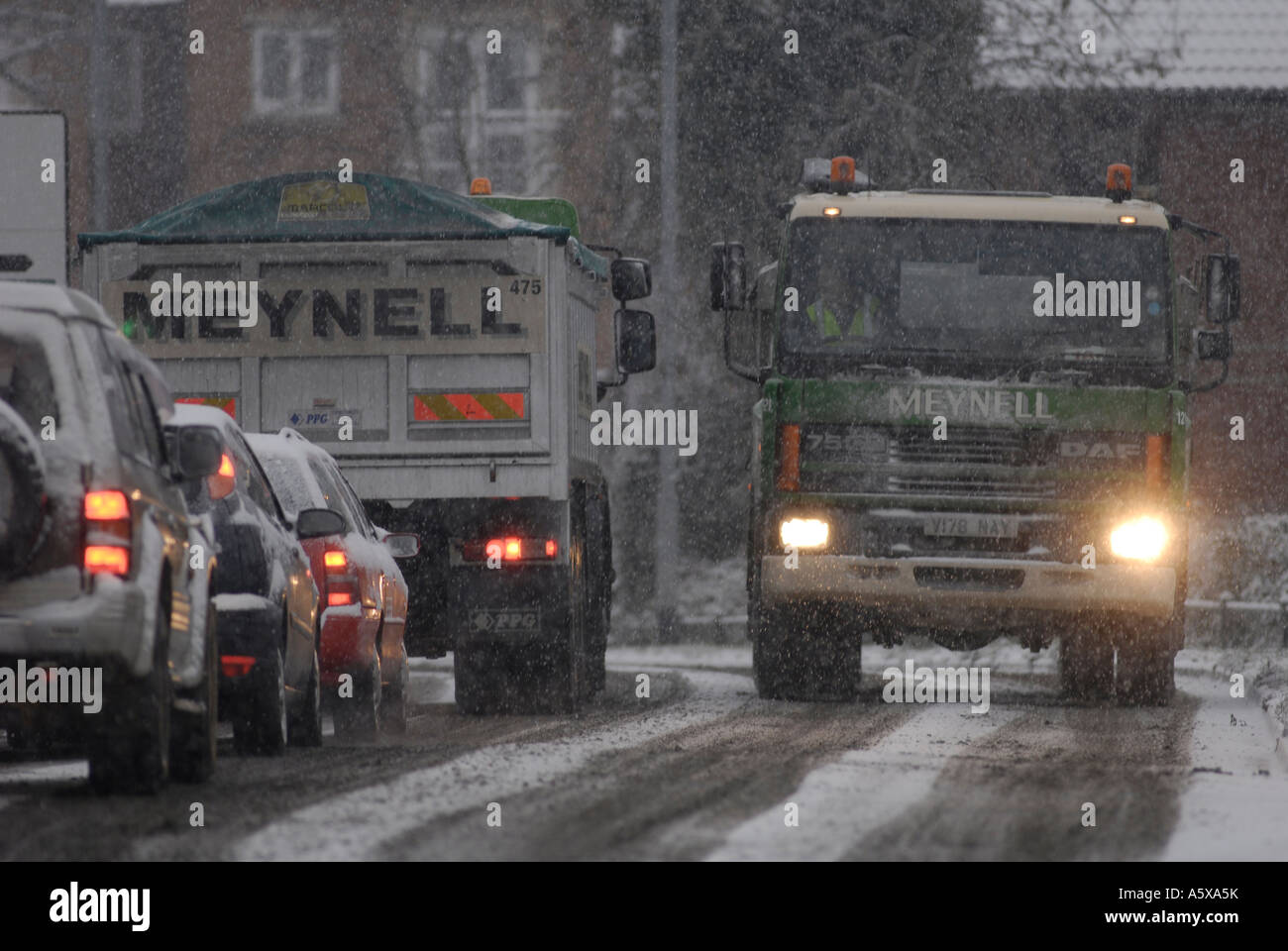 Lorries holding up traffic whilst having a chat Stock Photo - Alamy