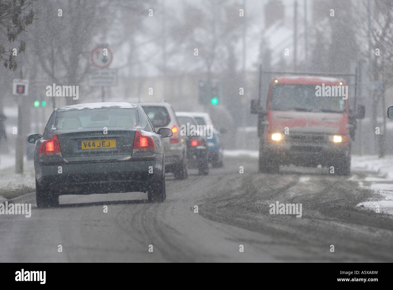 Car slowly driving on slippery hi-res stock photography and images - Alamy