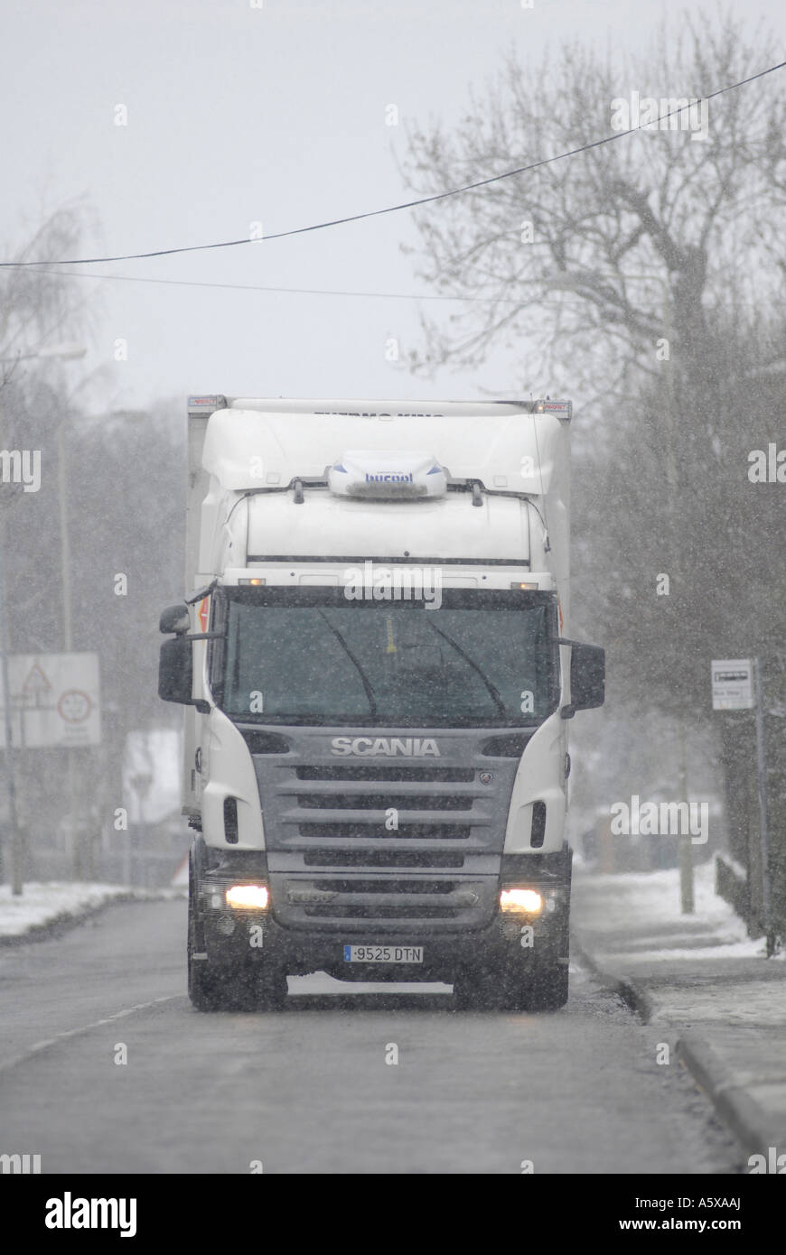 Scania R500 lorry refrigerated unit on Spanish plates driving along a ...