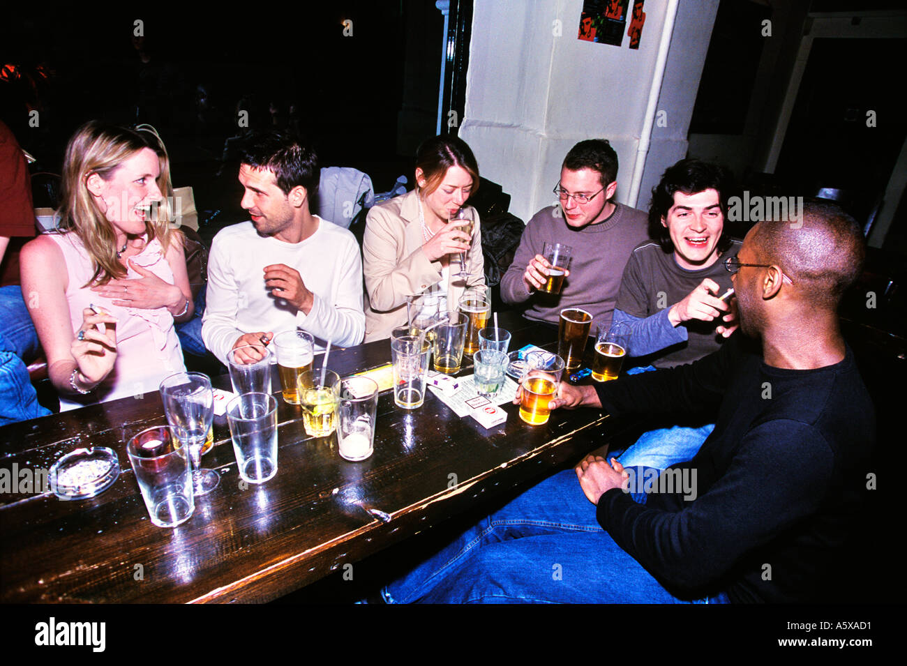 Uk friends socializing night hi-res stock photography and images - Alamy