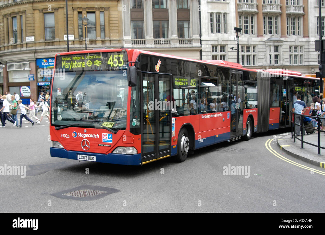Bendy bus Mercedes Citaro driving through the centre of the city of ...