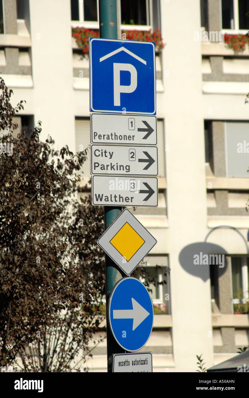 Parking signs on a street in Bolzano Italy Stock Photo - Alamy