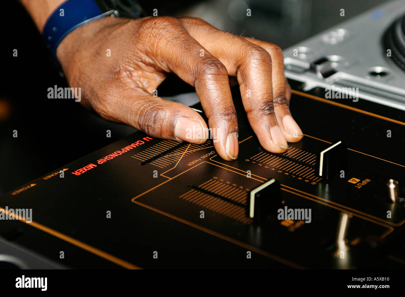 Close up of hand on cross fader at the DMC Technics World DJ ...