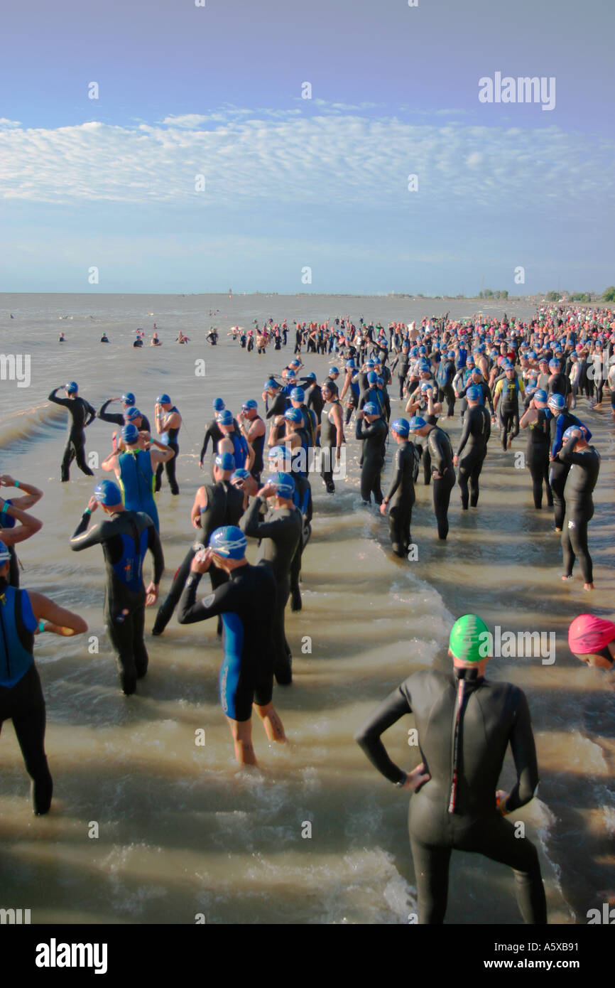 Different groups don common colored swimming caps for identity in this ...