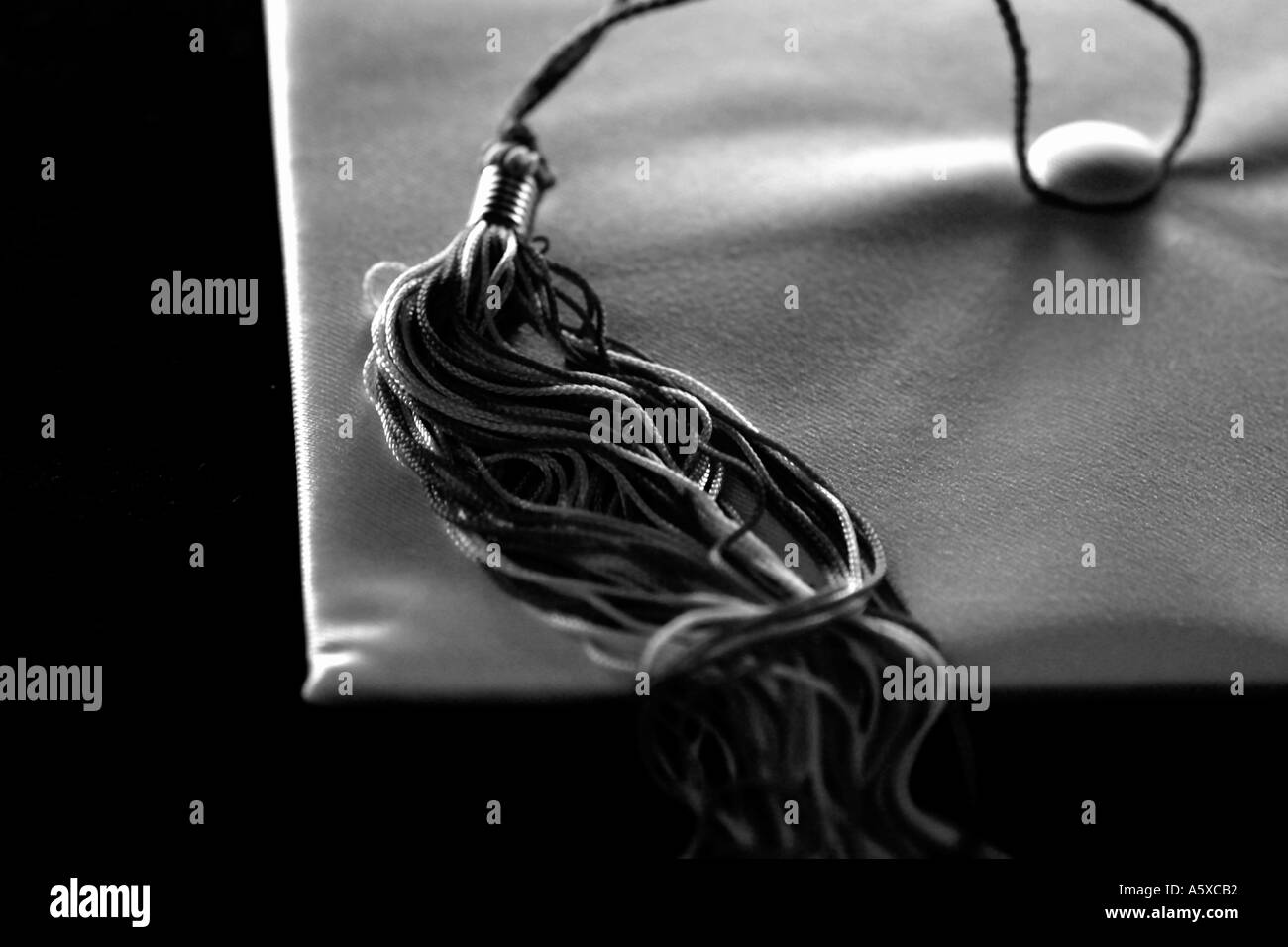 Graduation cap tassel in Black and White Stock Photos & Images - Alamy