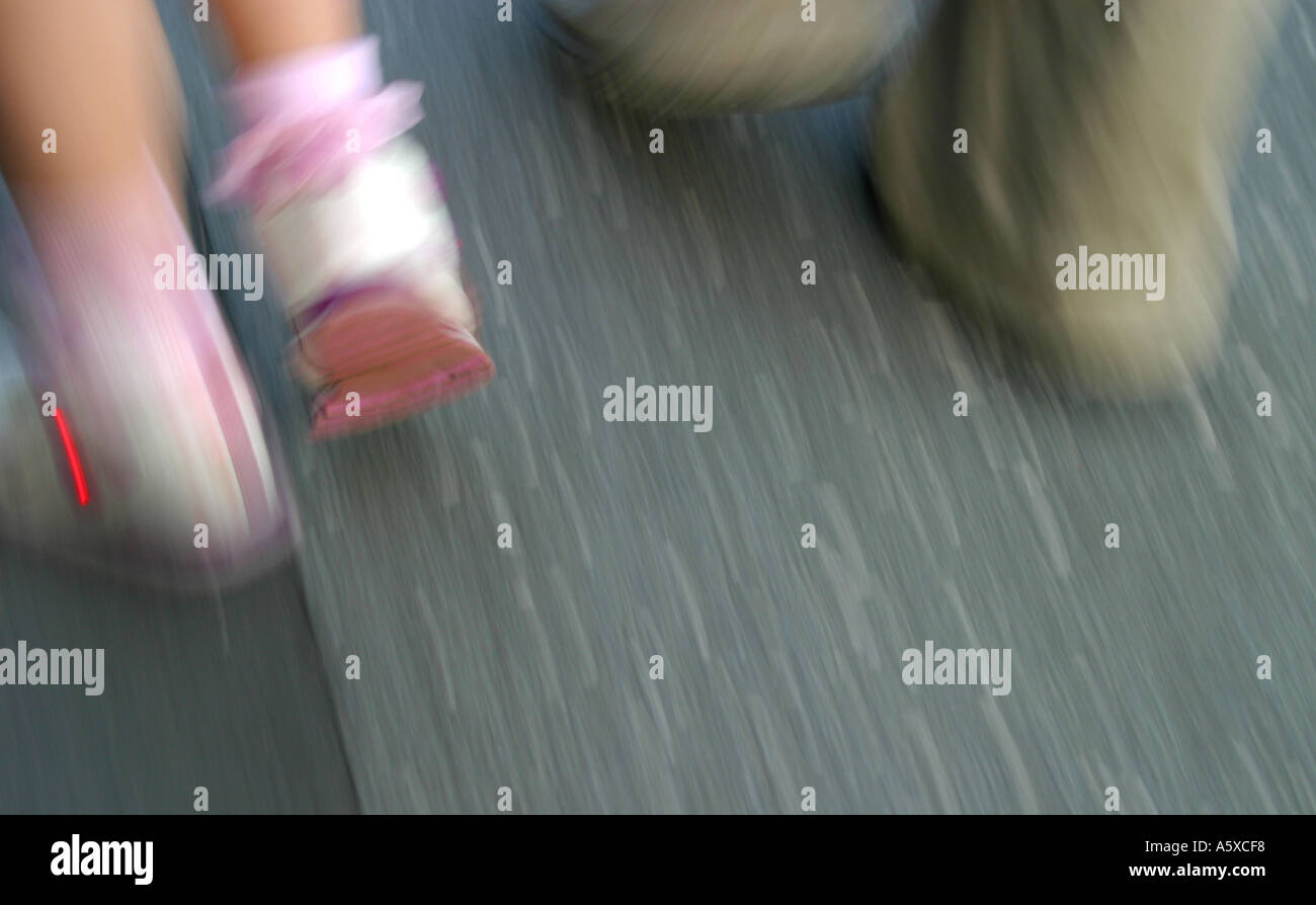 Mom and child feet walking hi-res stock photography and images - Alamy