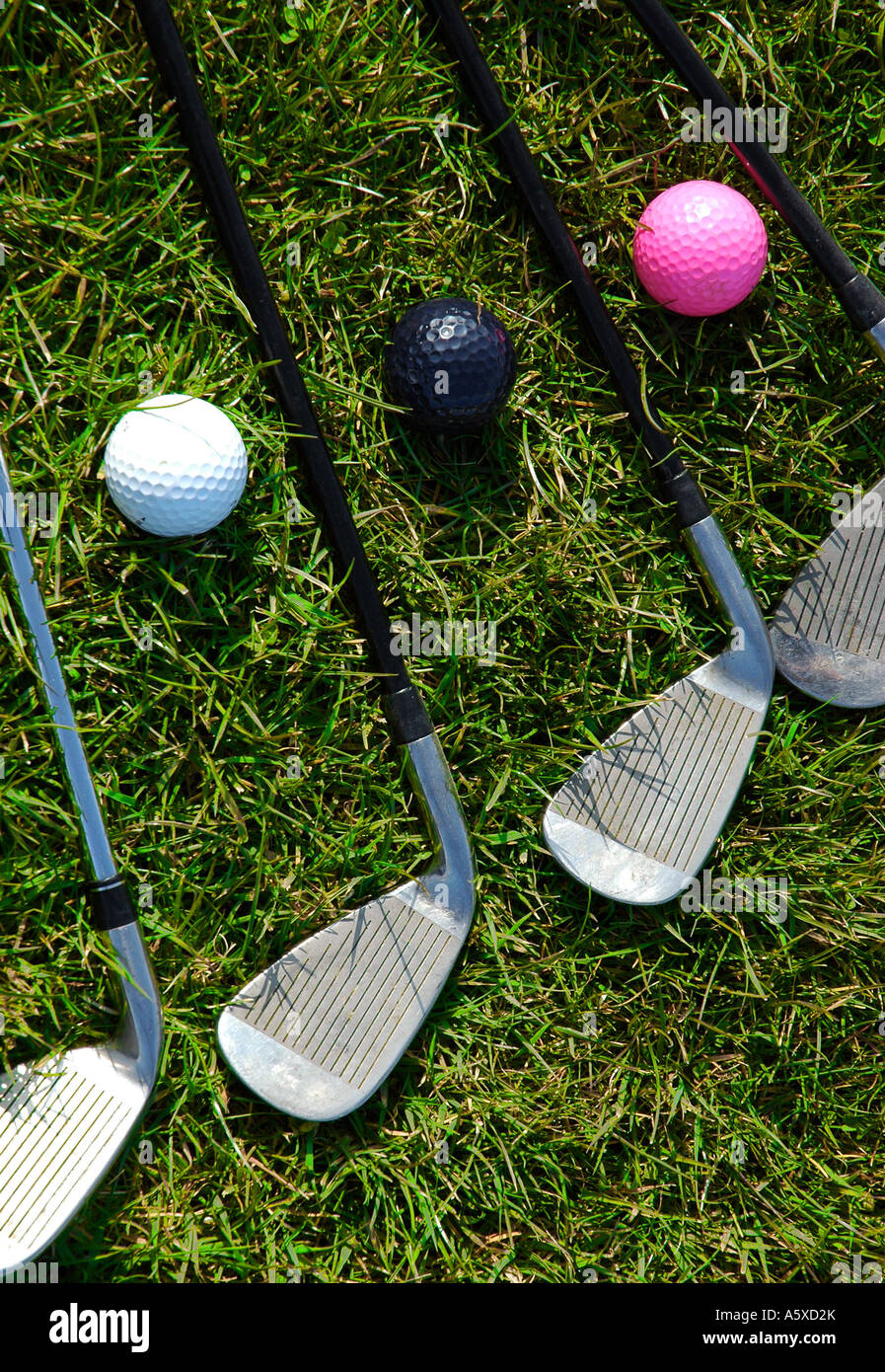 Golf ball lined up with golf club hi-res stock photography and images ...