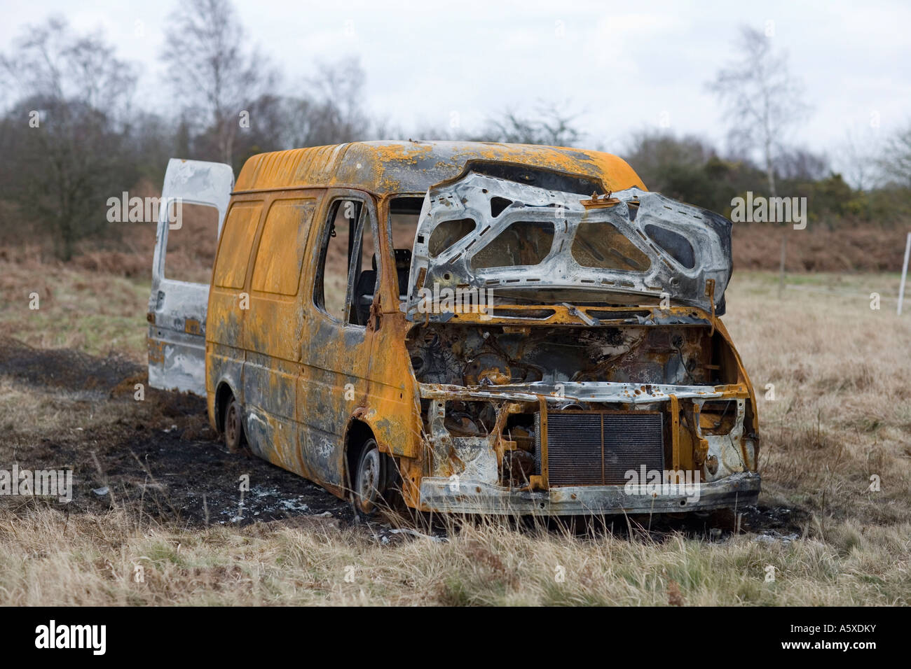 Old burnt out van Stock Photo - Alamy