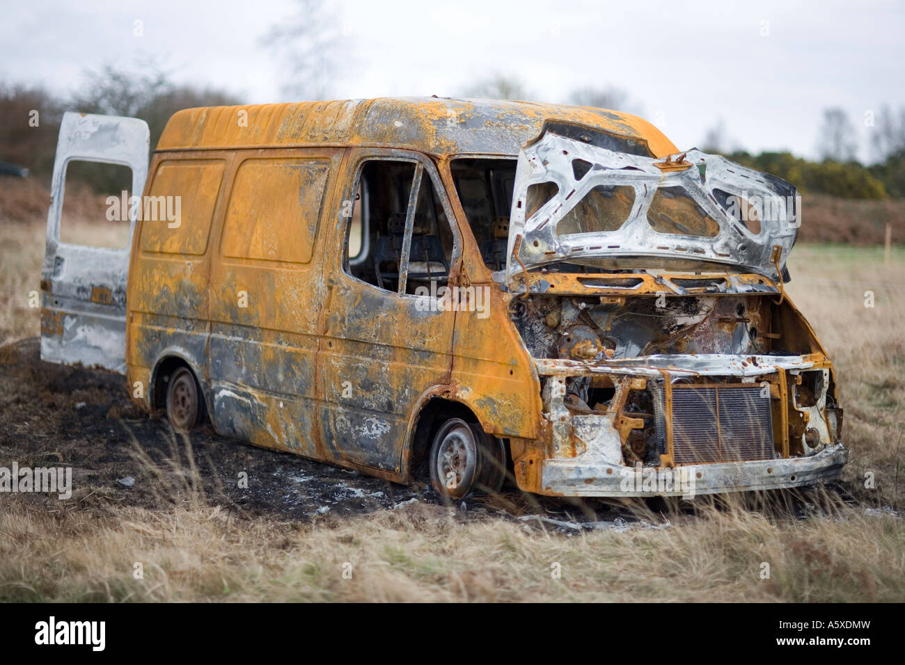 Old burnt out van Stock Photo - Alamy
