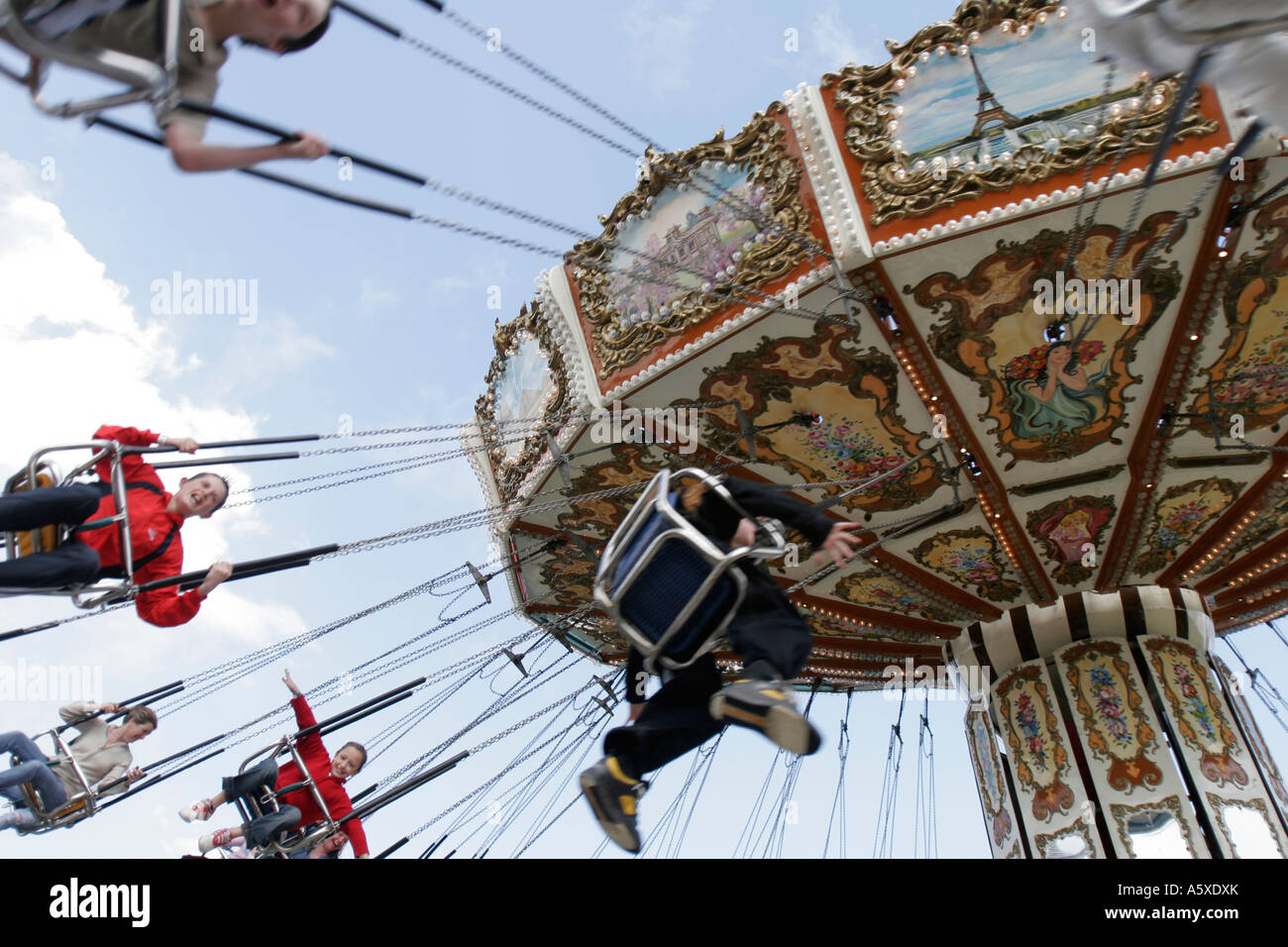 Fairground swing ride children hi-res stock photography and images - Alamy