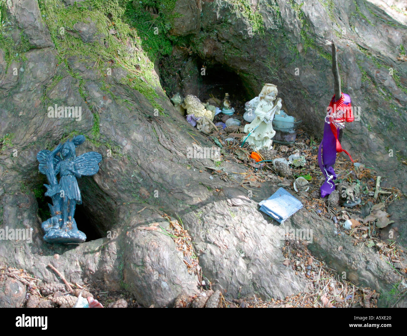 Model fairy figure at entrance to magical tree in fairy ring Aberfoyle ...