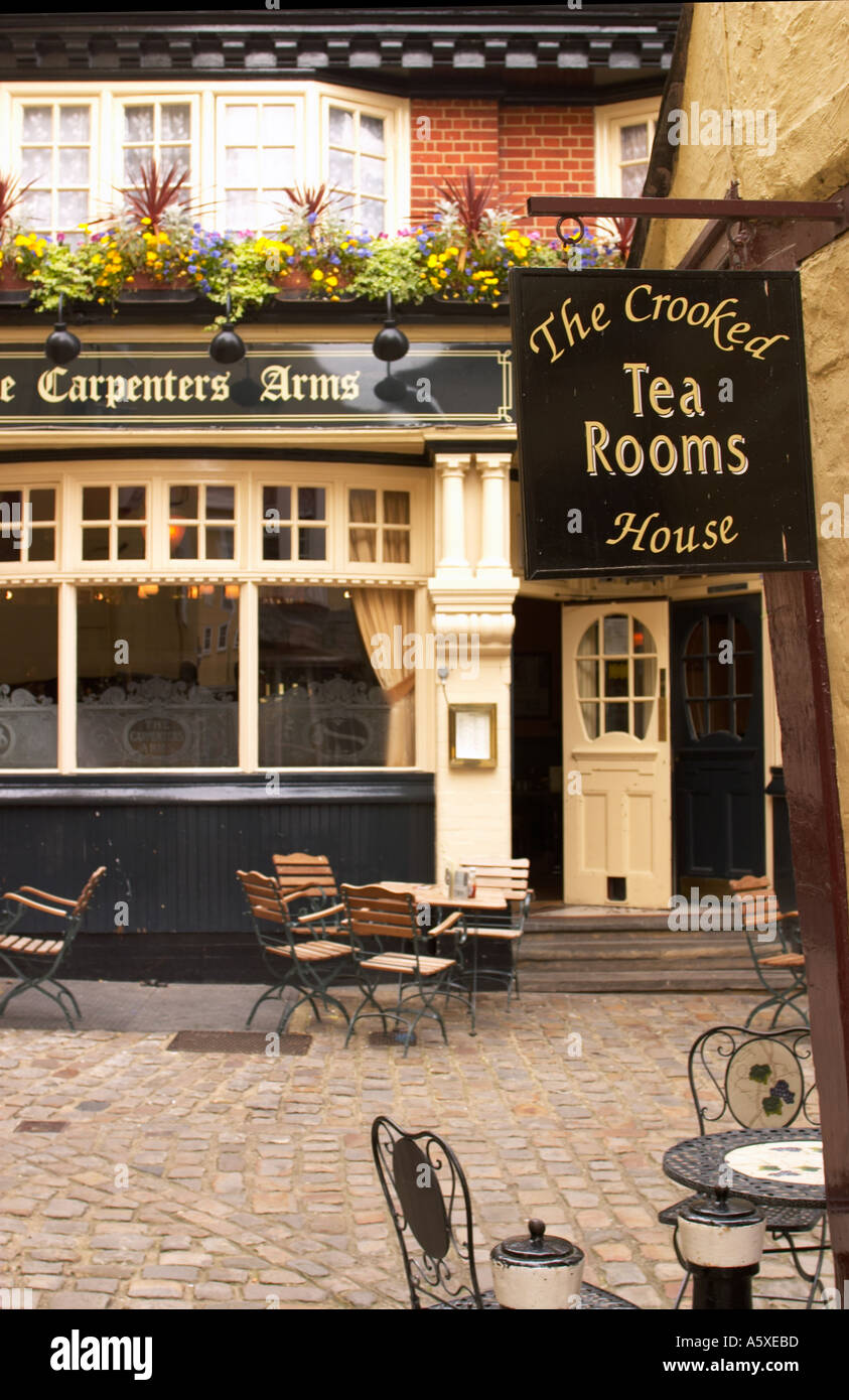 ENGLAND Windsor Crooked Tea House sign chairs and tables outdoors ...
