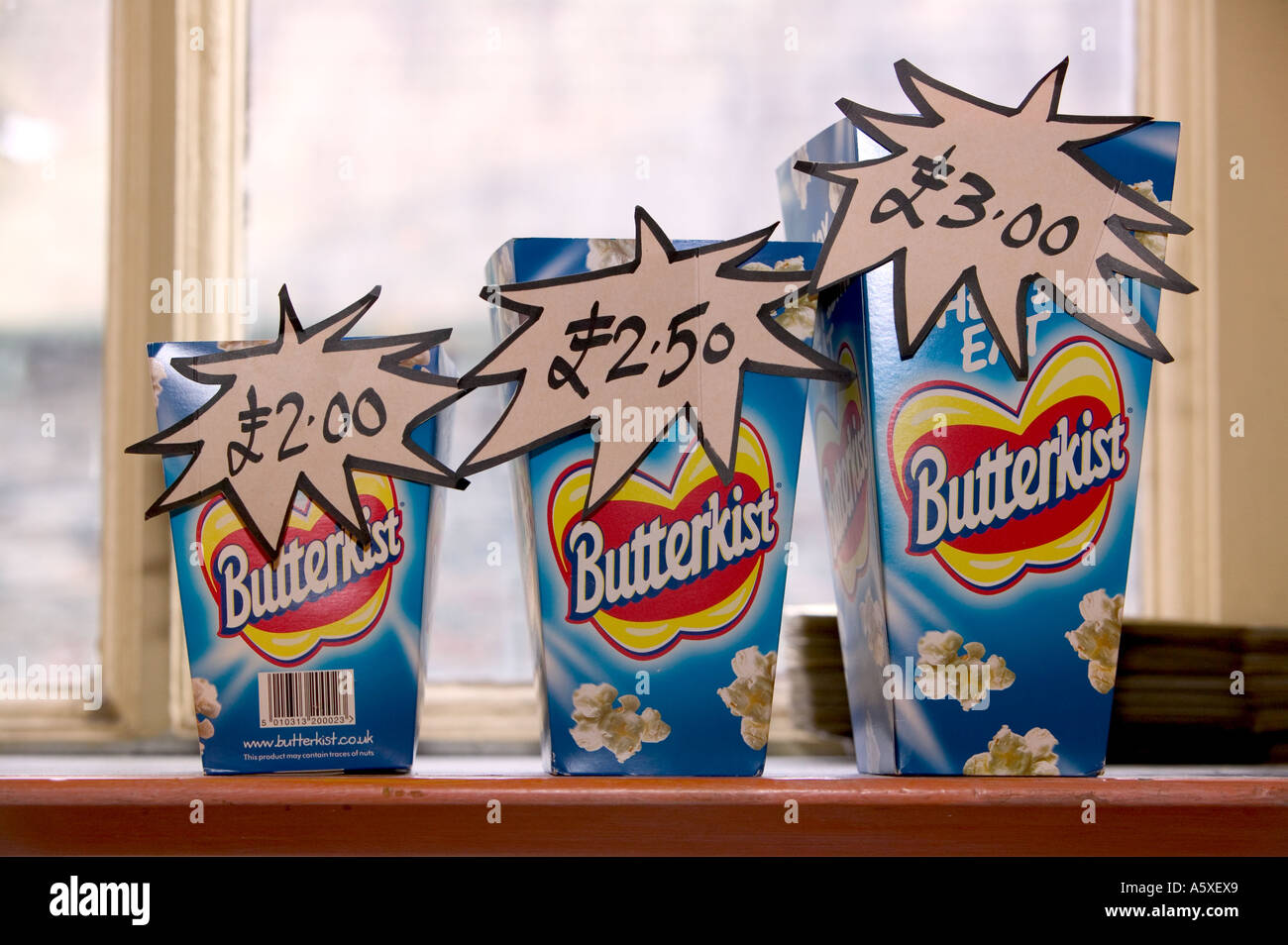 Cinema popcorn sizes hi-res stock photography and images - Alamy