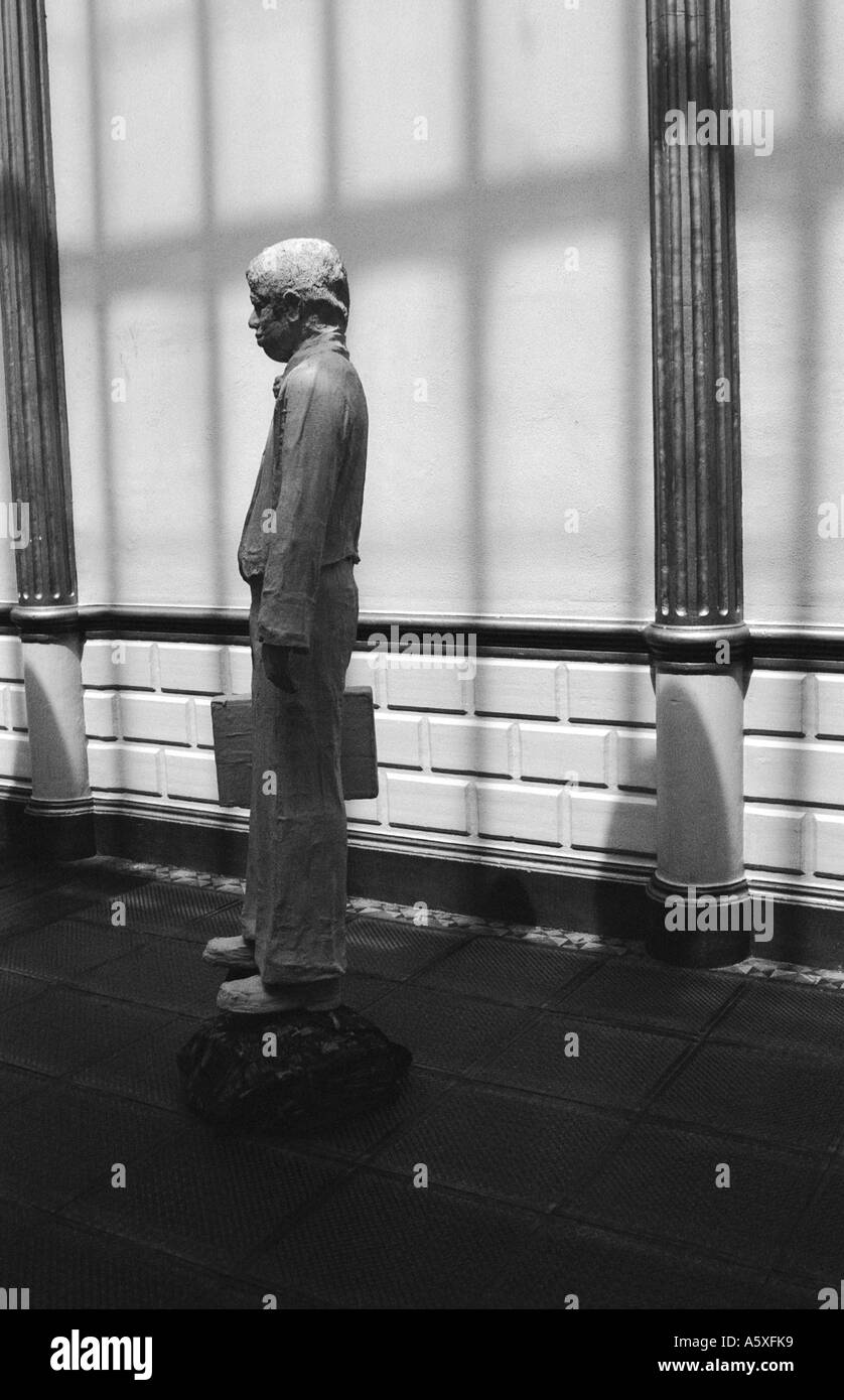 Man of plaster with a briefcase Stock Photo - Alamy