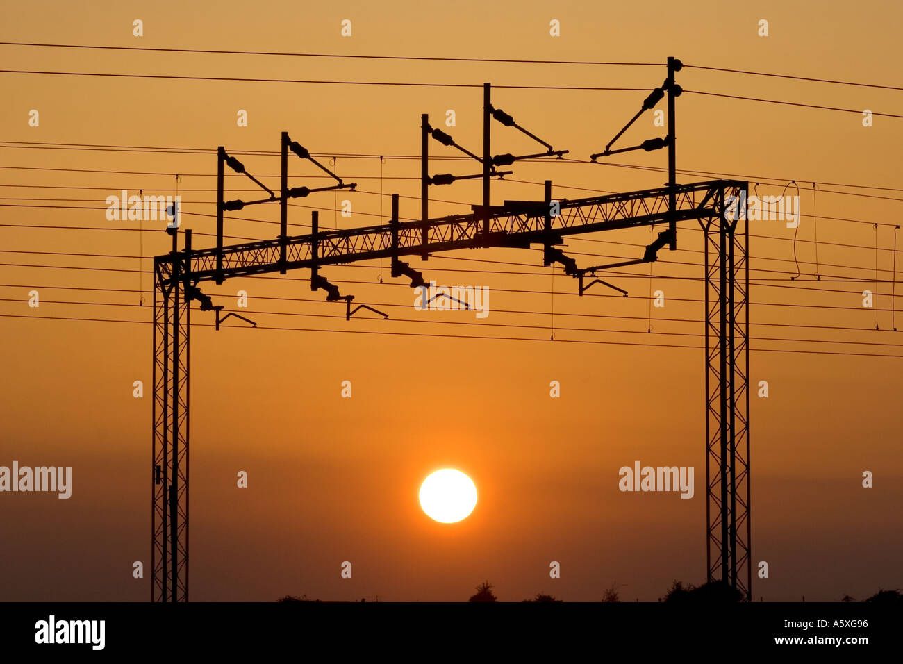 West Coast Mainline Railway overhead power gantry Stock Photo - Alamy