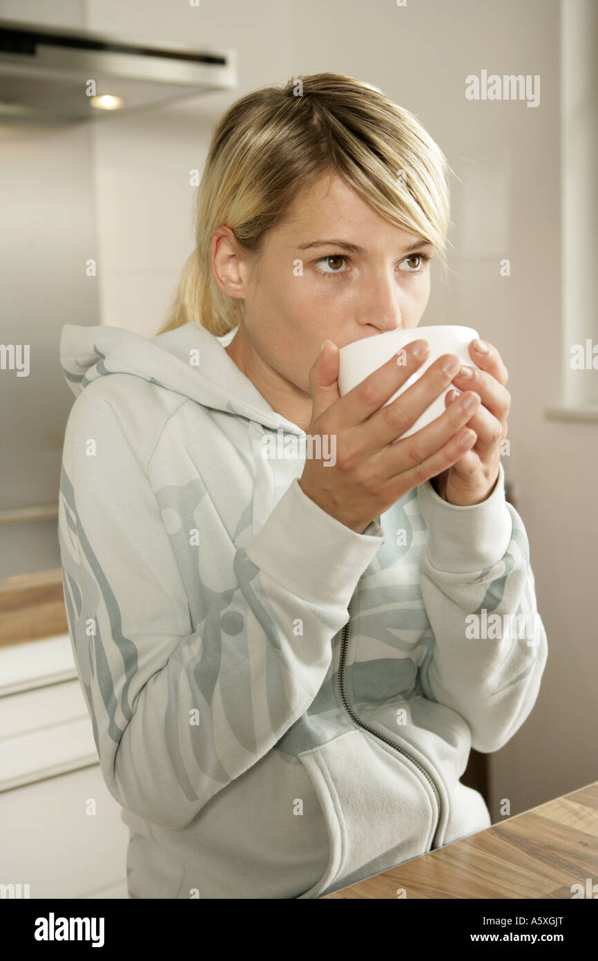 Mid adult women drinking coffee portrait Stock Photo - Alamy