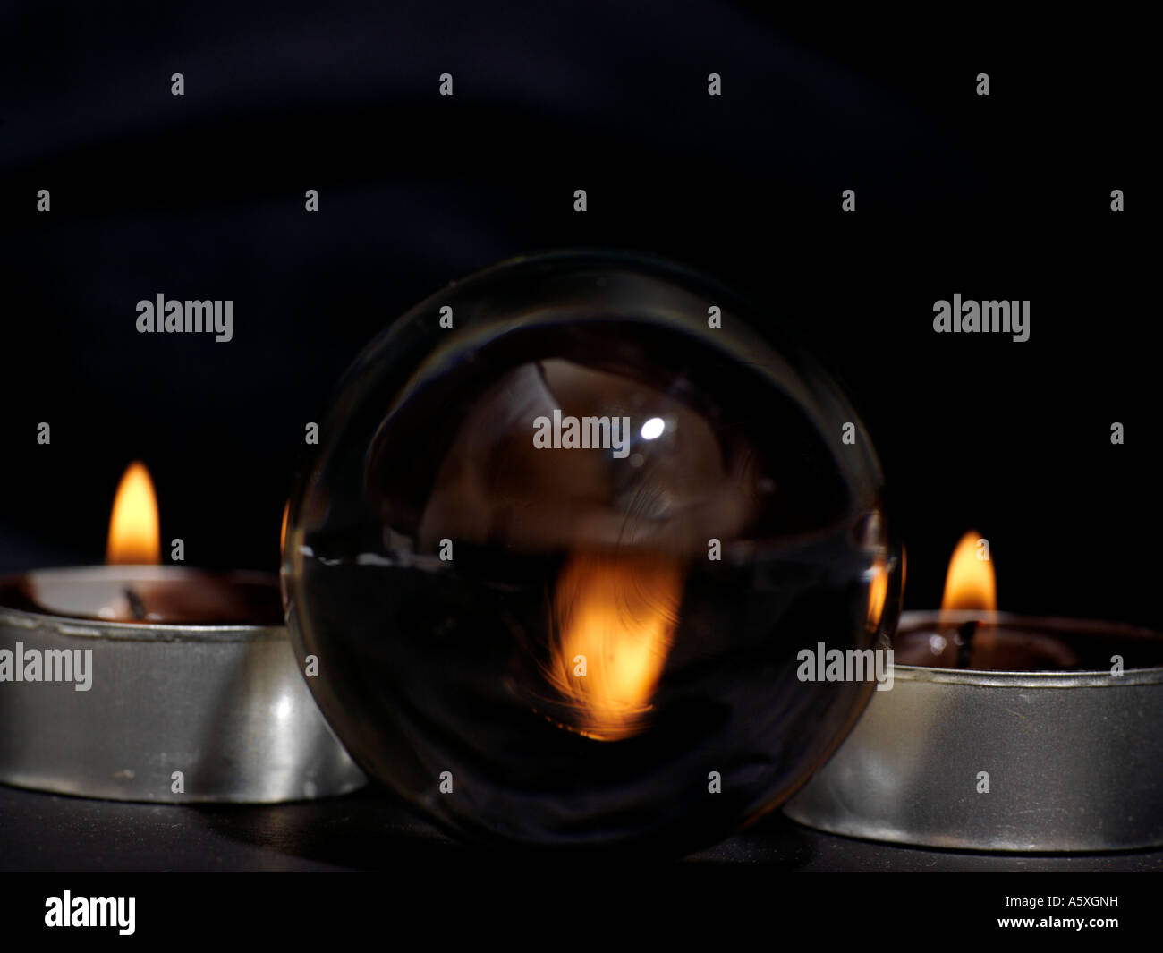 Crystal Ball with Candles Stock Photo - Alamy