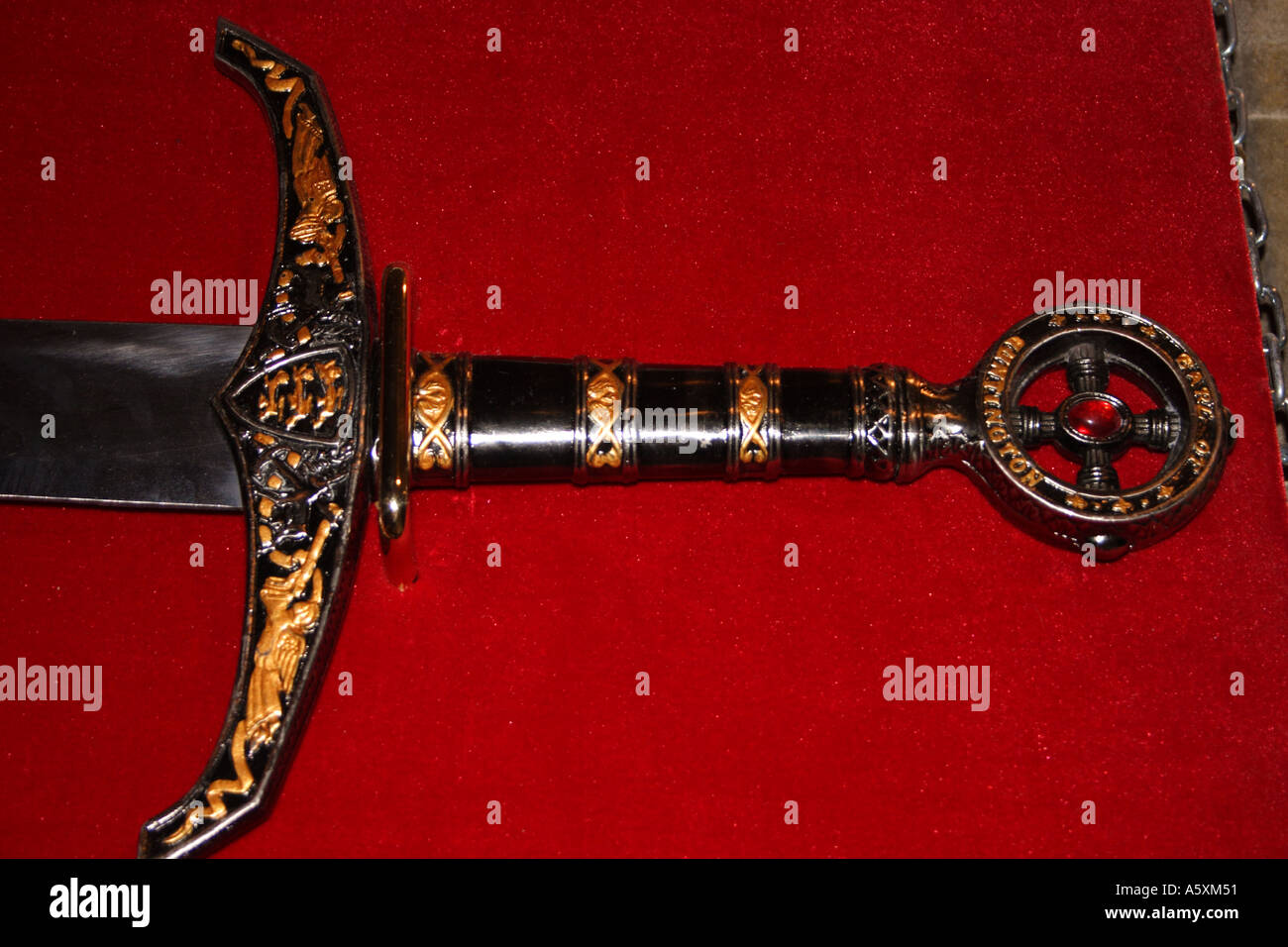 A MEDIEVAL CASTLE CONTAINING SWORDS AND ARMOUR Stock Photo - Alamy