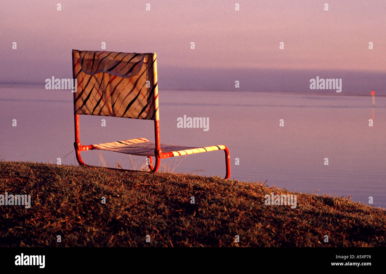 A FOLDING CHAIR SUNRISE CALOUNDRA QUEENSLAND AUSTRALIA Stock Photo - Alamy