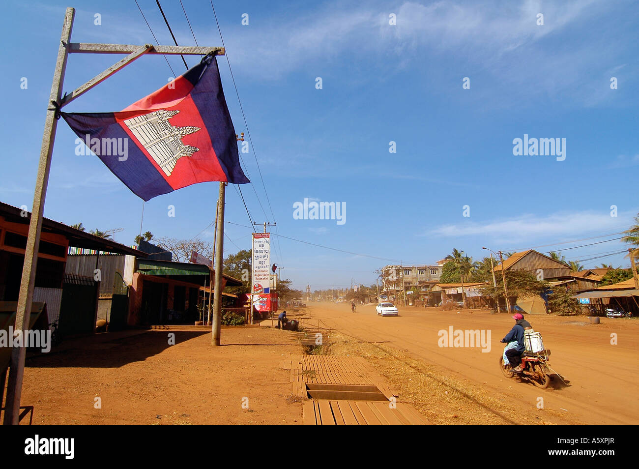 Street scene in the dusty town of Banlung, in Rattanak Kiri province ...