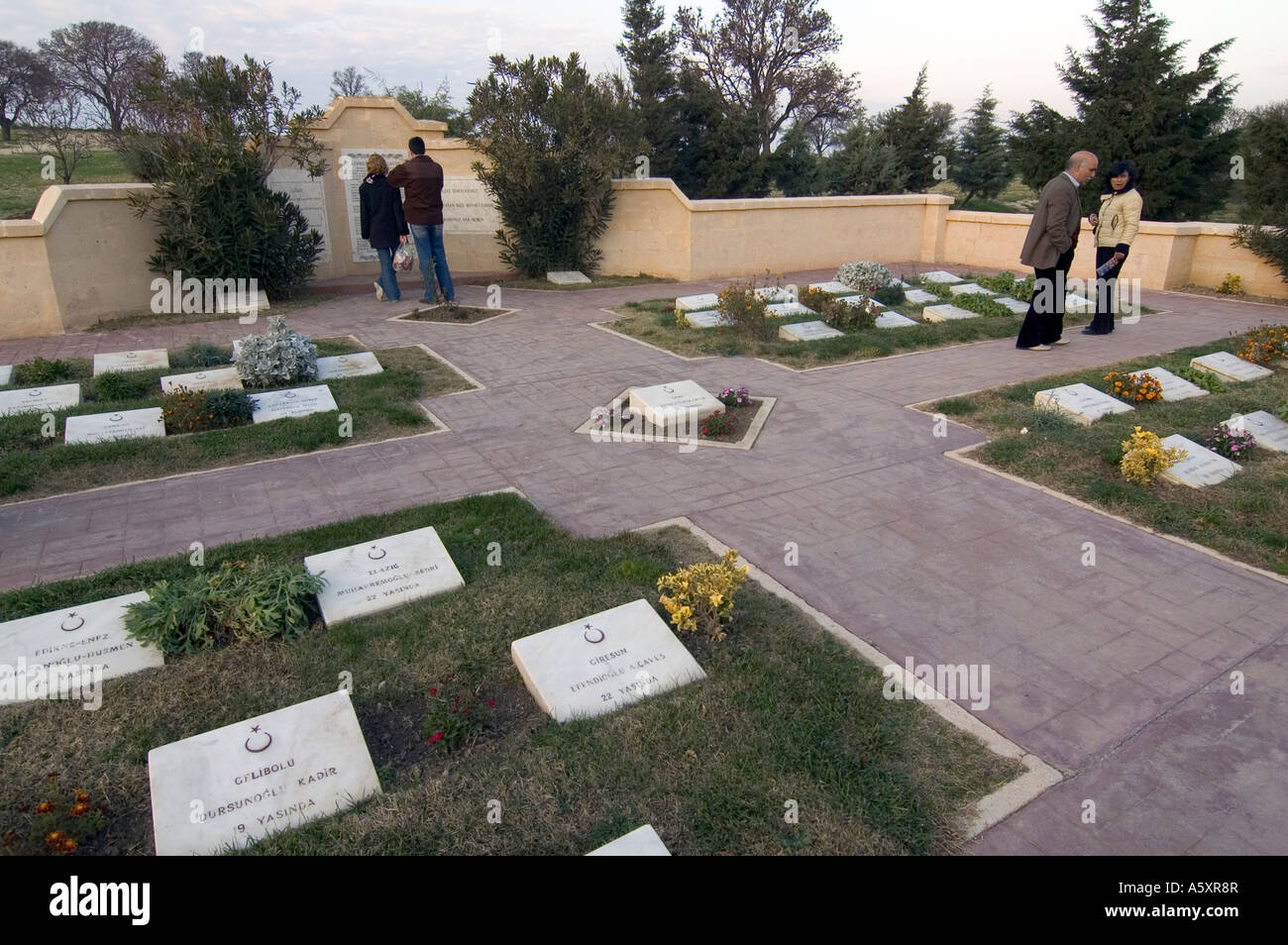 Tourists visiting a Turkish graveyard memorial on the Gallipoli ...