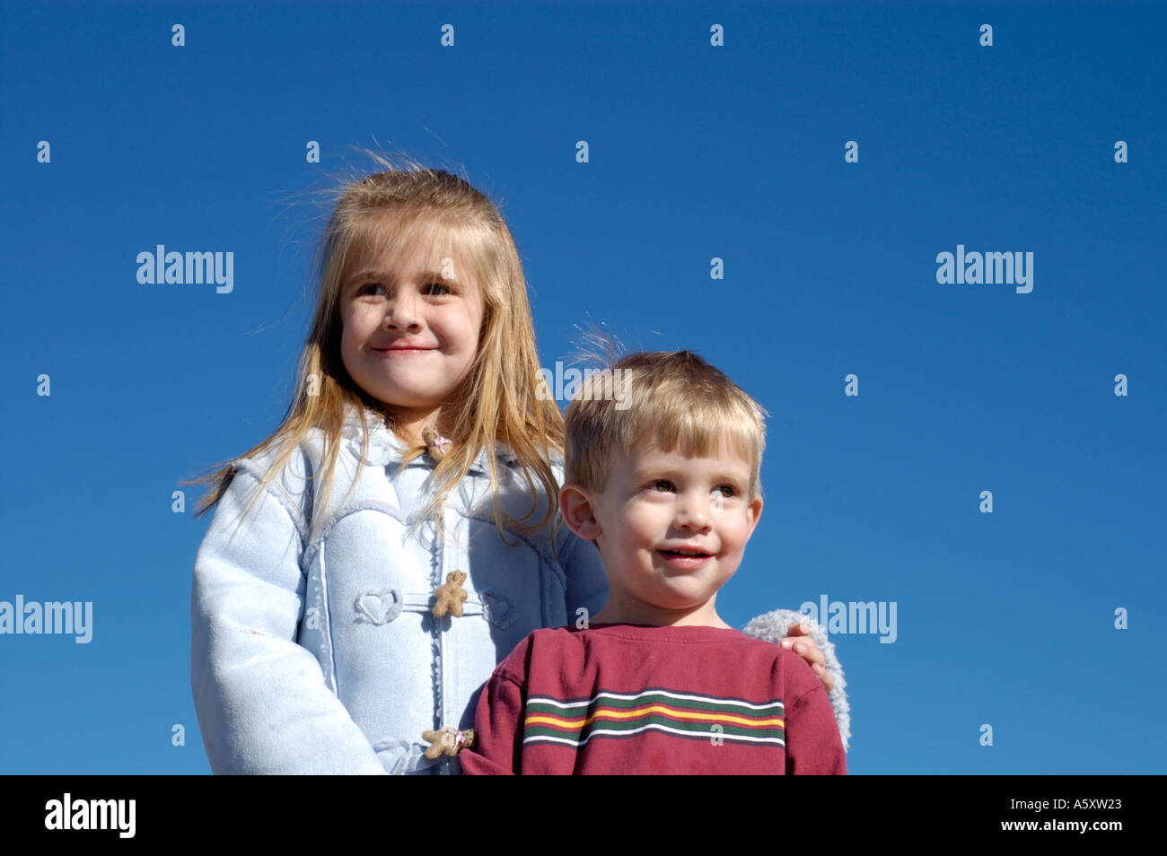 Brother sister standing together hi-res stock photography and images ...