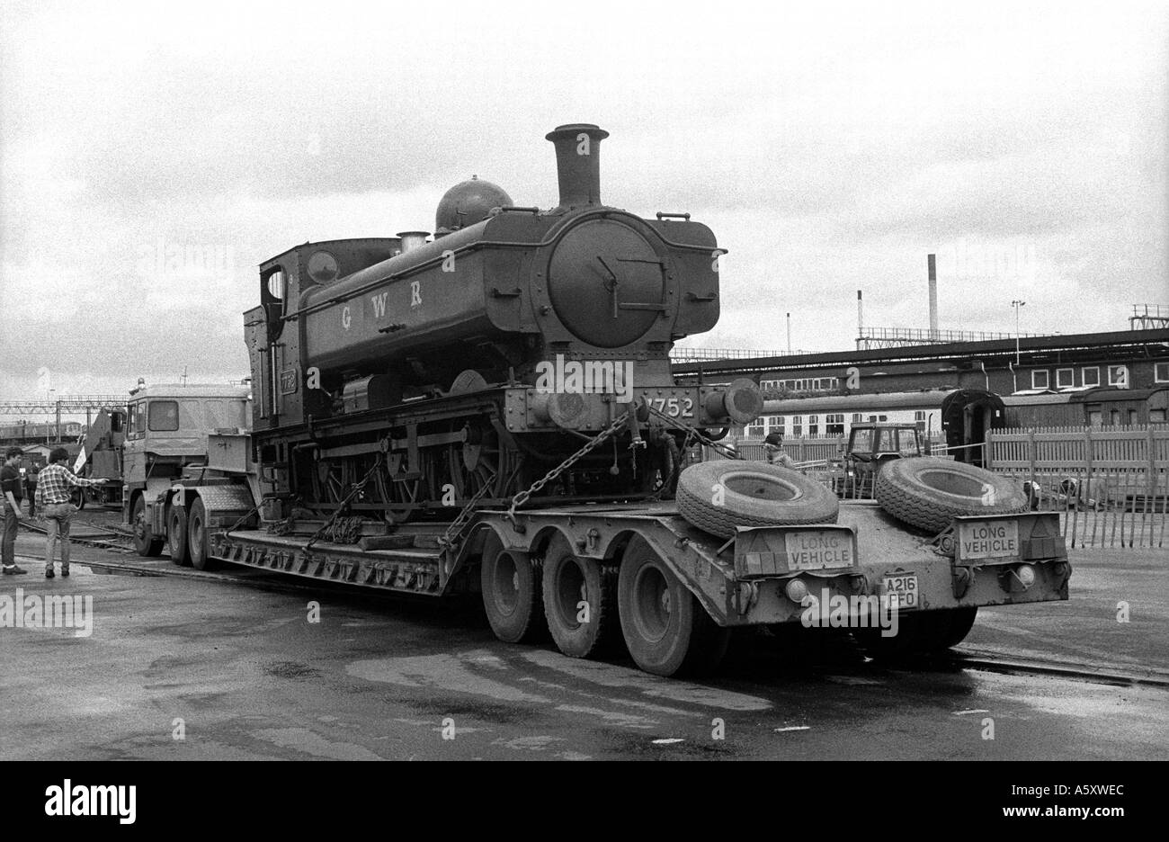GWR 0-6-0 pannier tank steam locomotive No. 7752 on low loader lorry ...