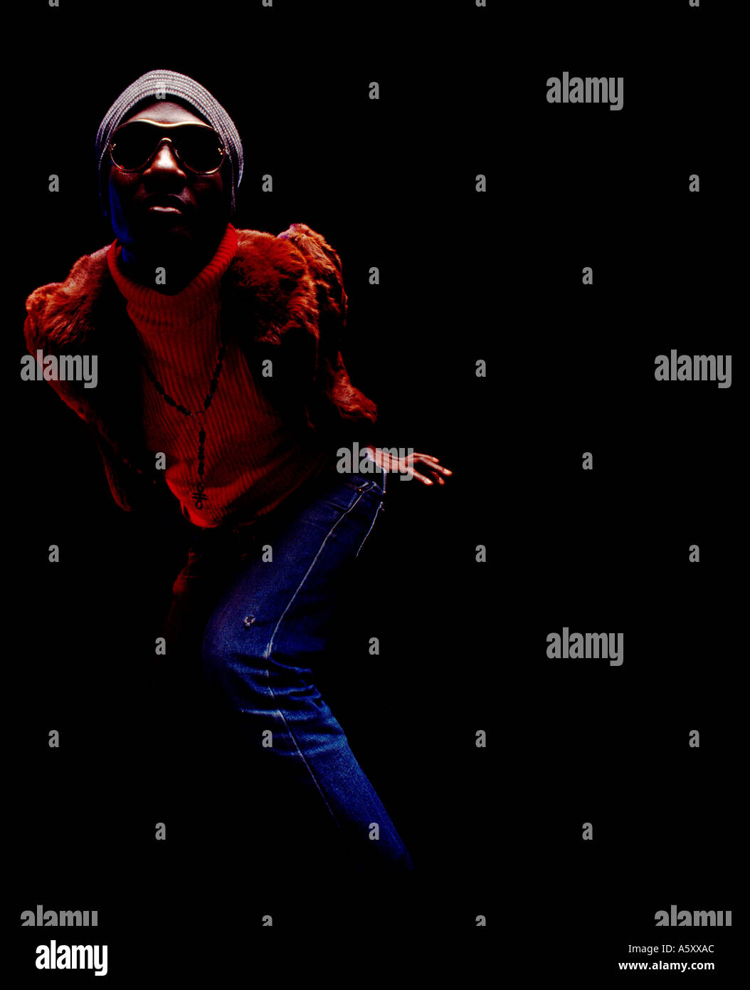 studio portrait man with fur coat Stock Photo - Alamy