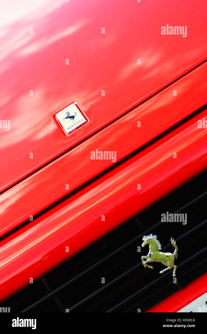Red Ferrari grill and emblem Stock Photo - Alamy