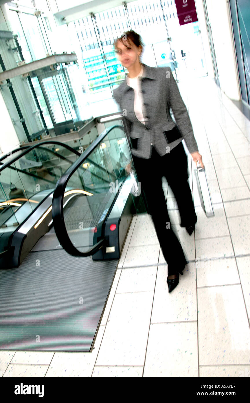 WOMAN EXECUTIVE WALKING Stock Photo - Alamy
