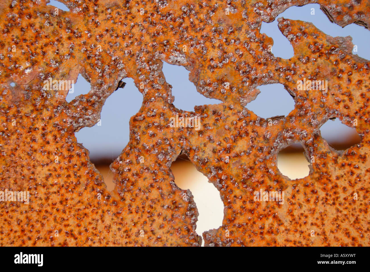 Rusted metal with holes hi-res stock photography and images - Alamy